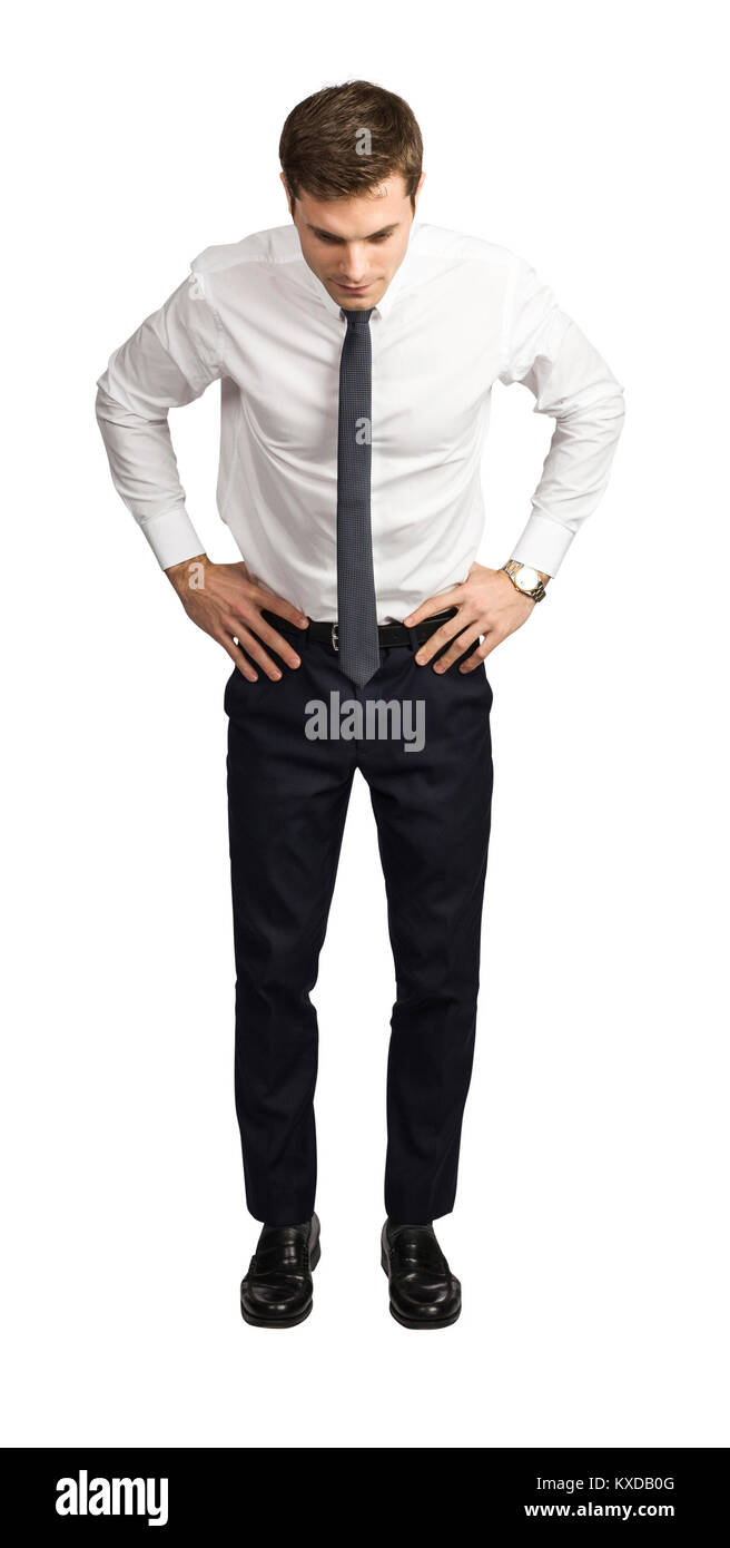 young caucasian businessman look down isolated on white background ...