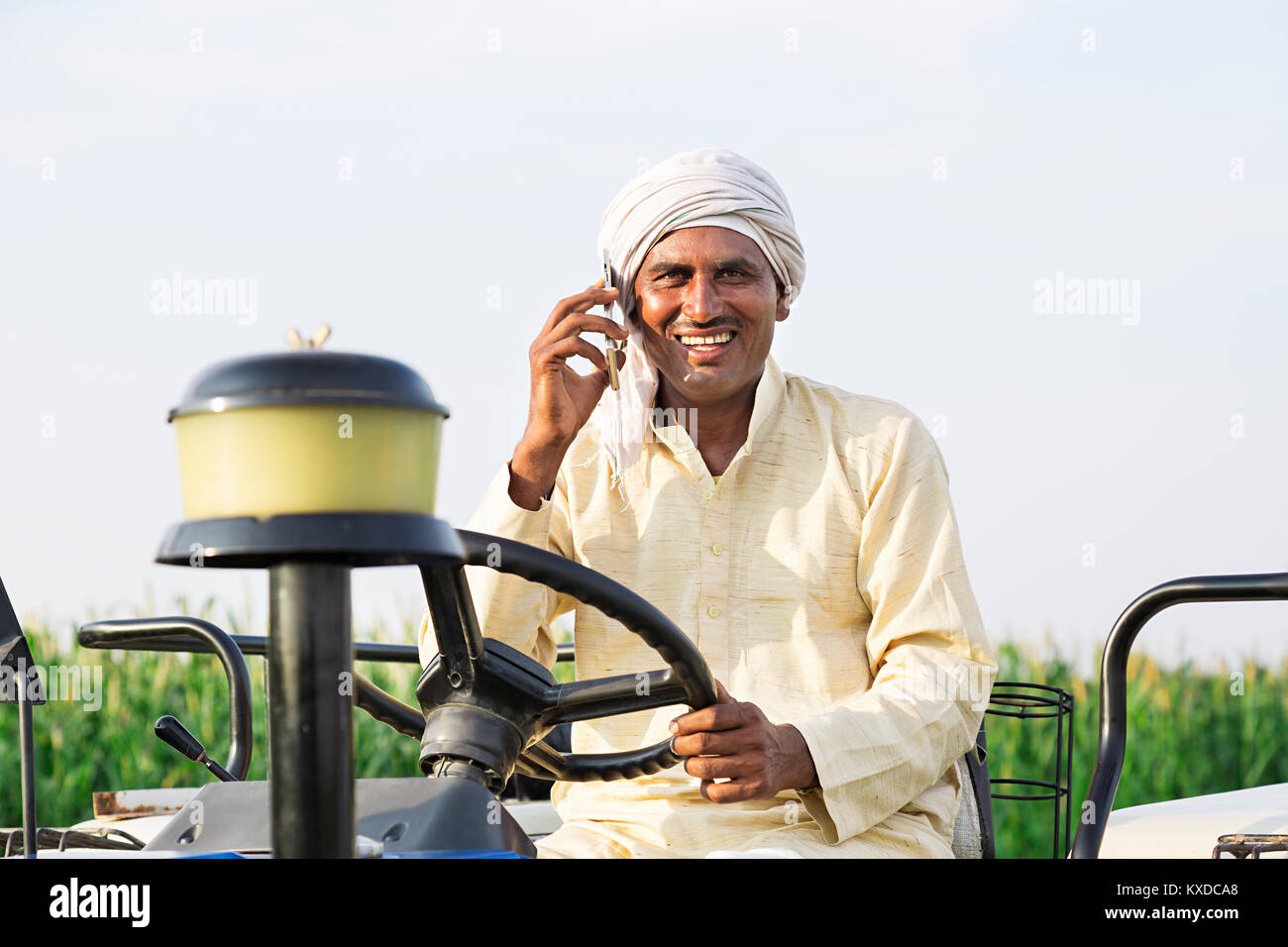1 Rural Farmer Sitting Tractor Talking Cell Phone Field Village Stock ...