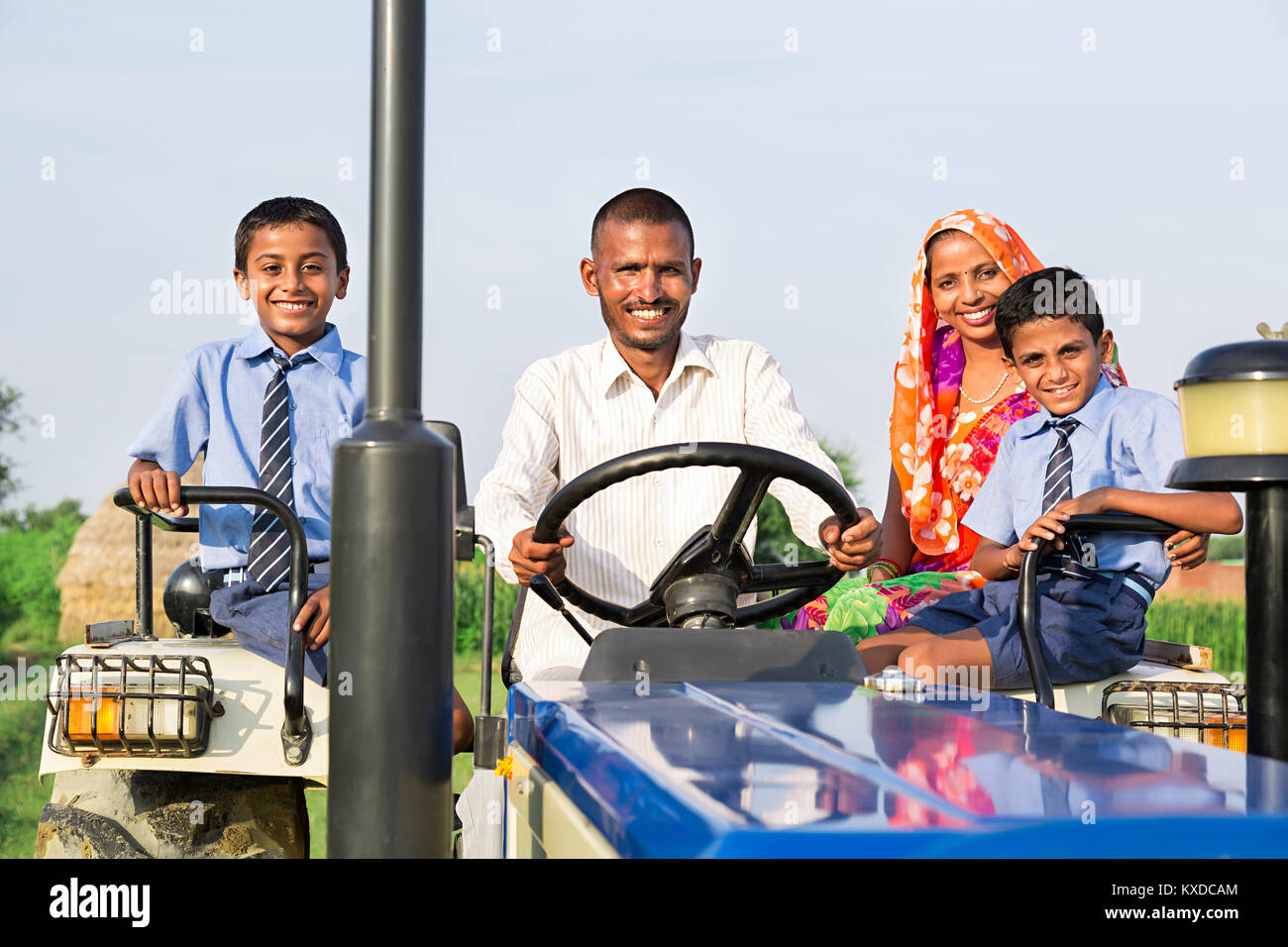 2 Rural Farmer Family Parents KidsTogether Ride Tractor Farm Stock ...