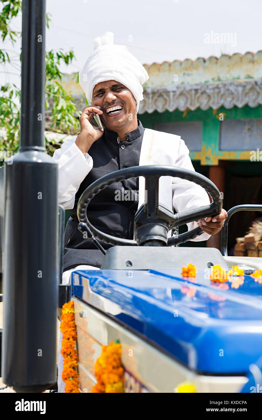 1 Indian Rural Farmer Man Sitting Tractor Talking Mobile Phone Stock ...