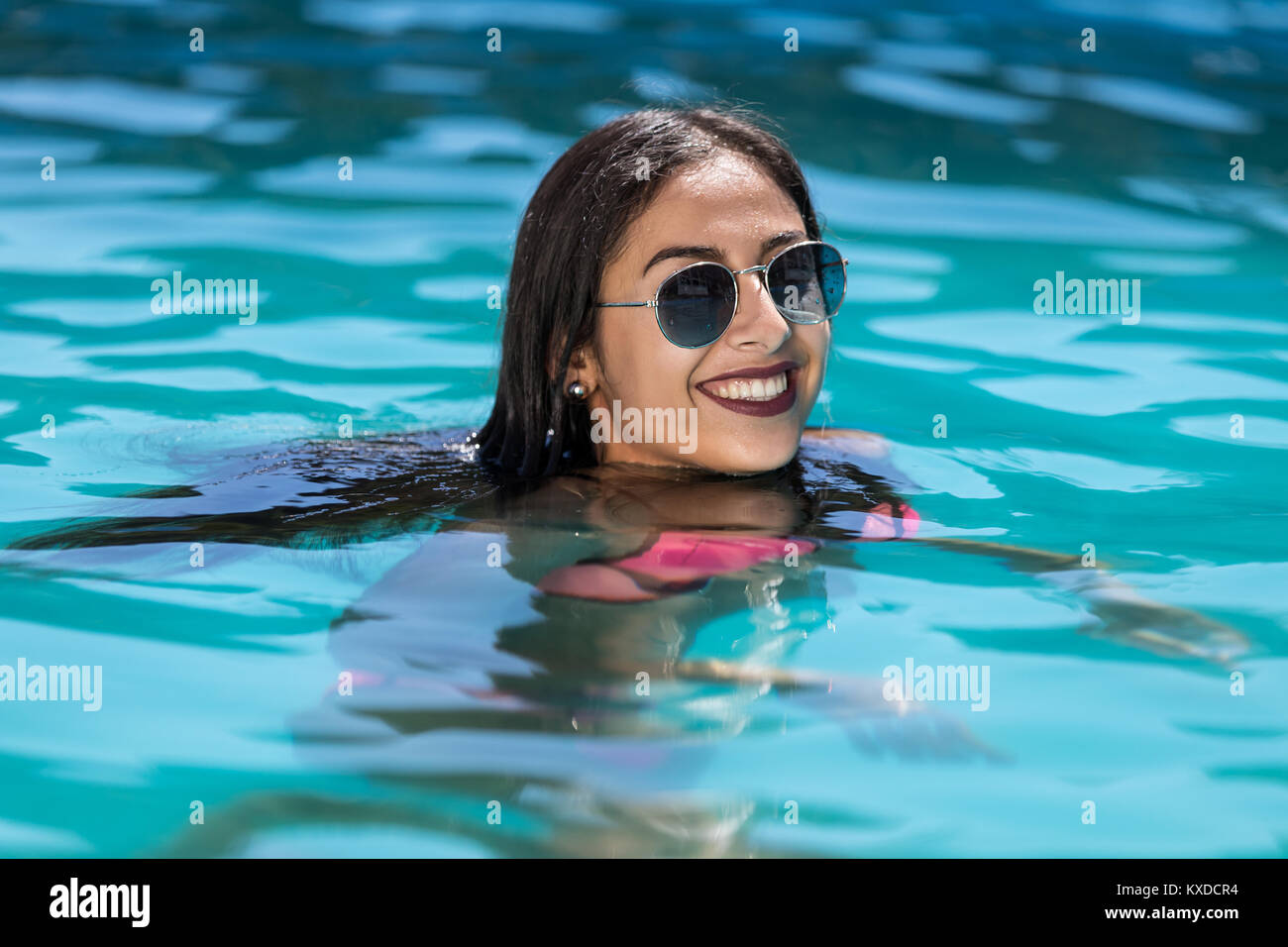Woman In Swimming Pool Smiling High Resolution Stock Photography and ...