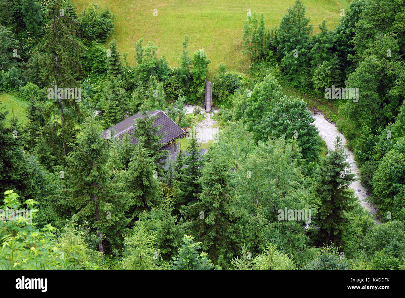 Shed roof and bridge over river in the forest, Austria Stock Photo - Alamy