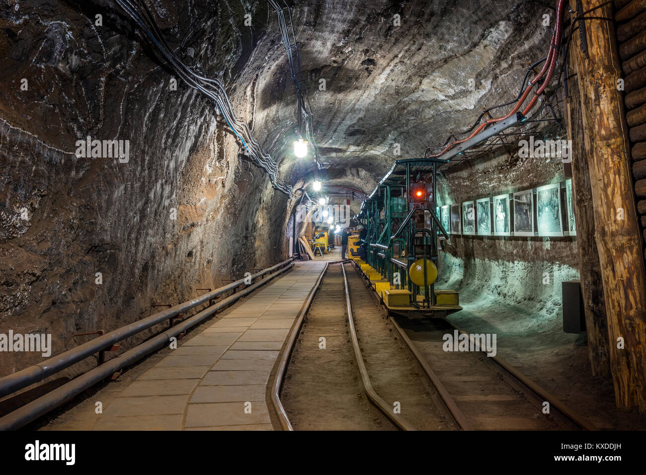 Yellow passenger underground train used in an old salt mine to ...