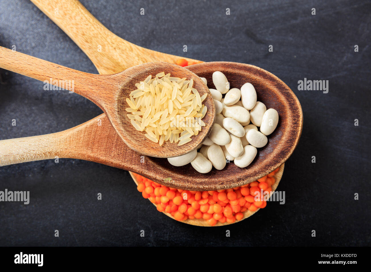 Rice with spoons hi-res stock photography and images - Alamy