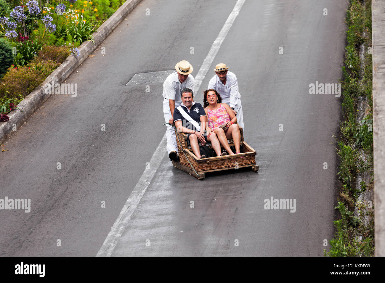 FUNCHAL, MADEIRA - JuLY 04: Traditional downhill sledge trip on July 04 ...