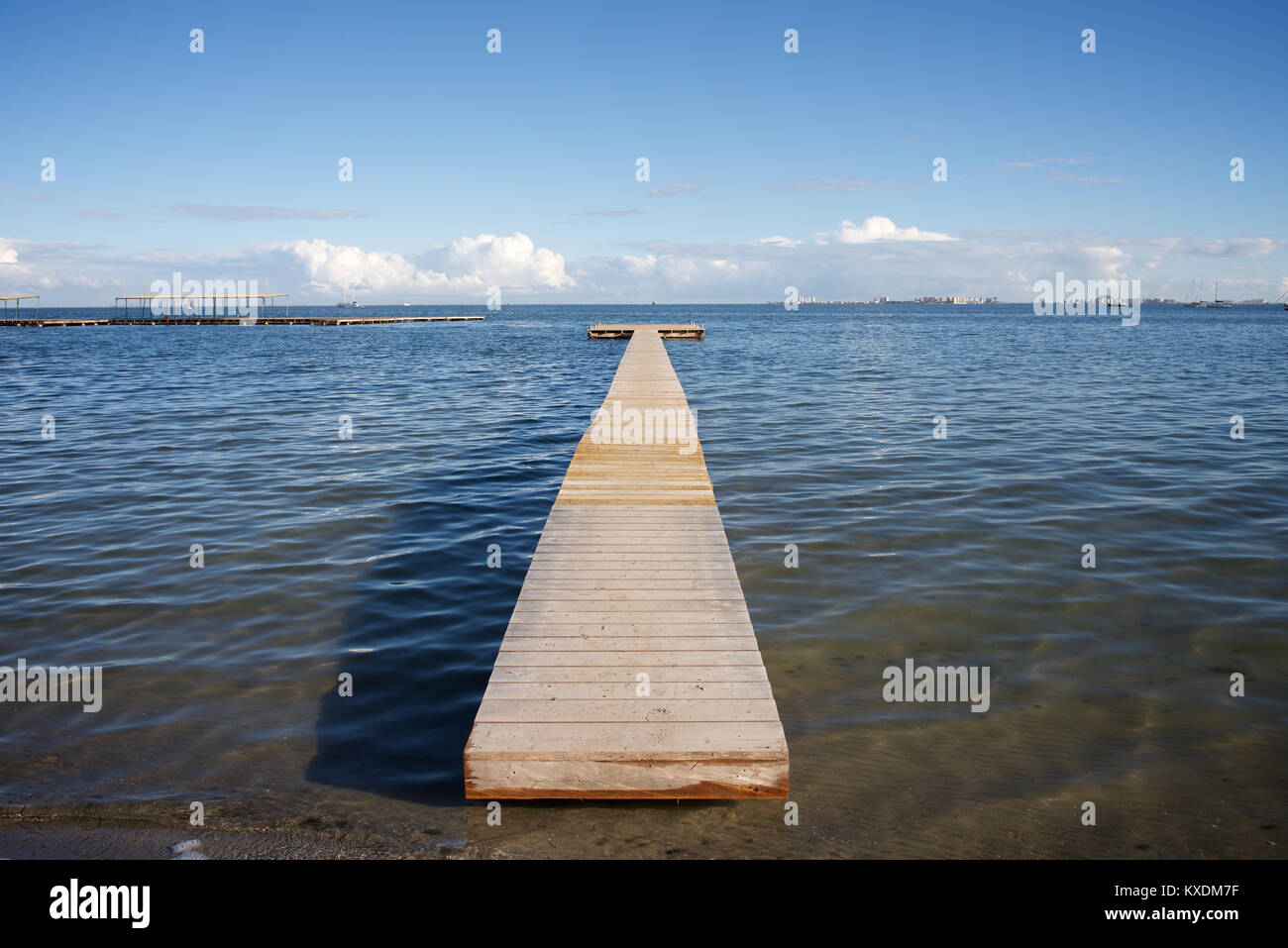 Jetty going out into the sea Stock Photo - Alamy