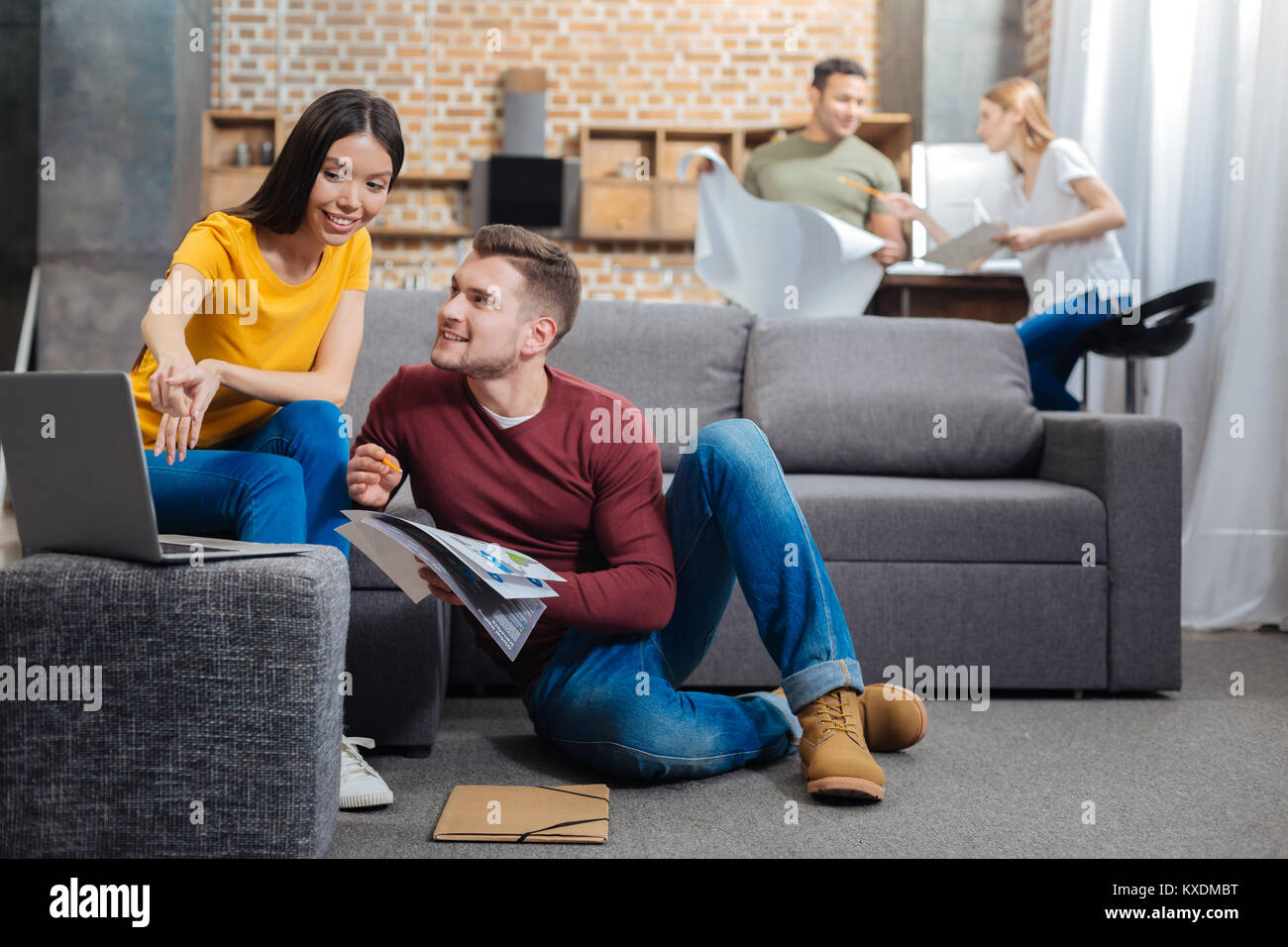 Friendly young people sitting hi-res stock photography and images - Alamy