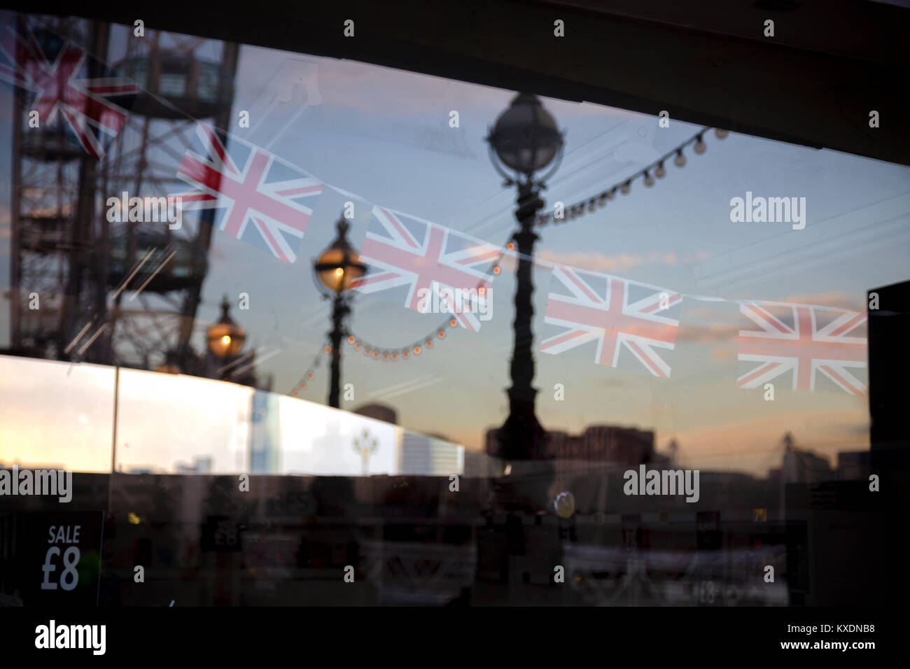 Illuminated Dolphin lamp posts and the London Eye Ferris wheel ...