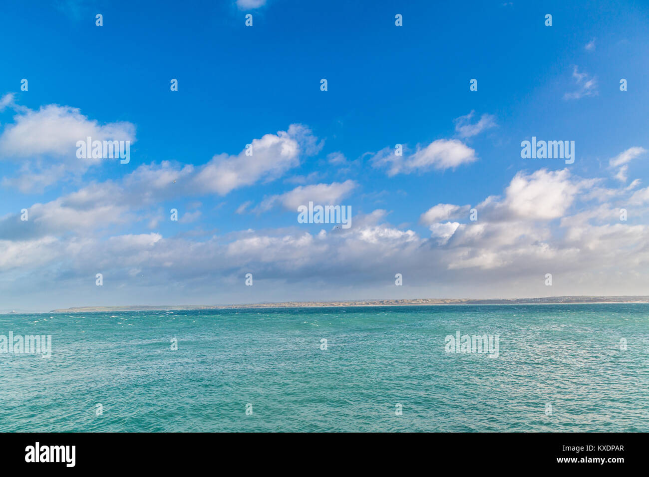 Cornwall. View from St Ives over the ocean with brilliant blue water ...