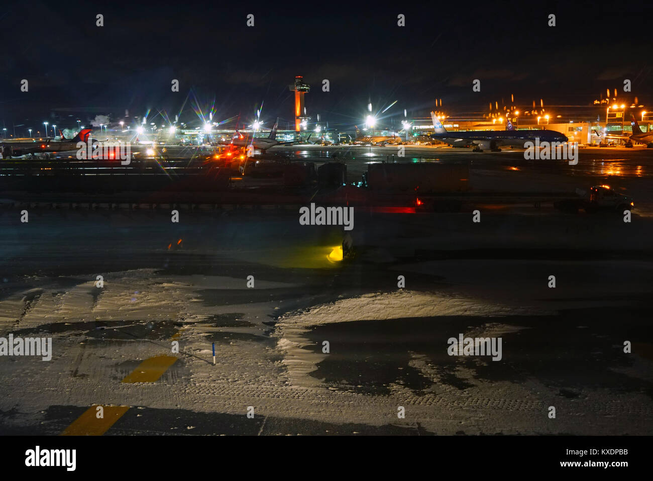 Night view of the operations mess and delays at the John F. Kennedy ...