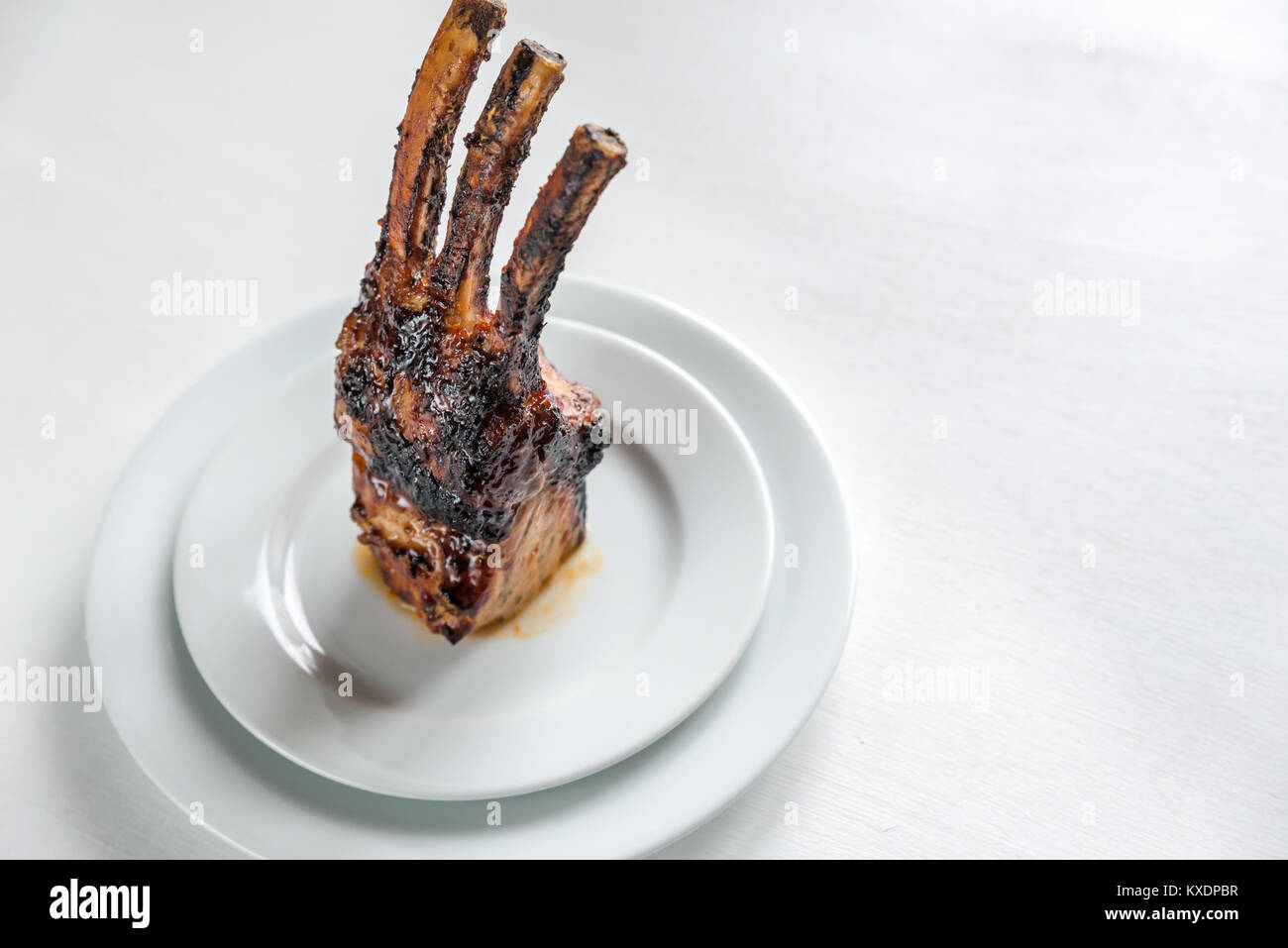 Portion of grilled pork ribs Stock Photo - Alamy
