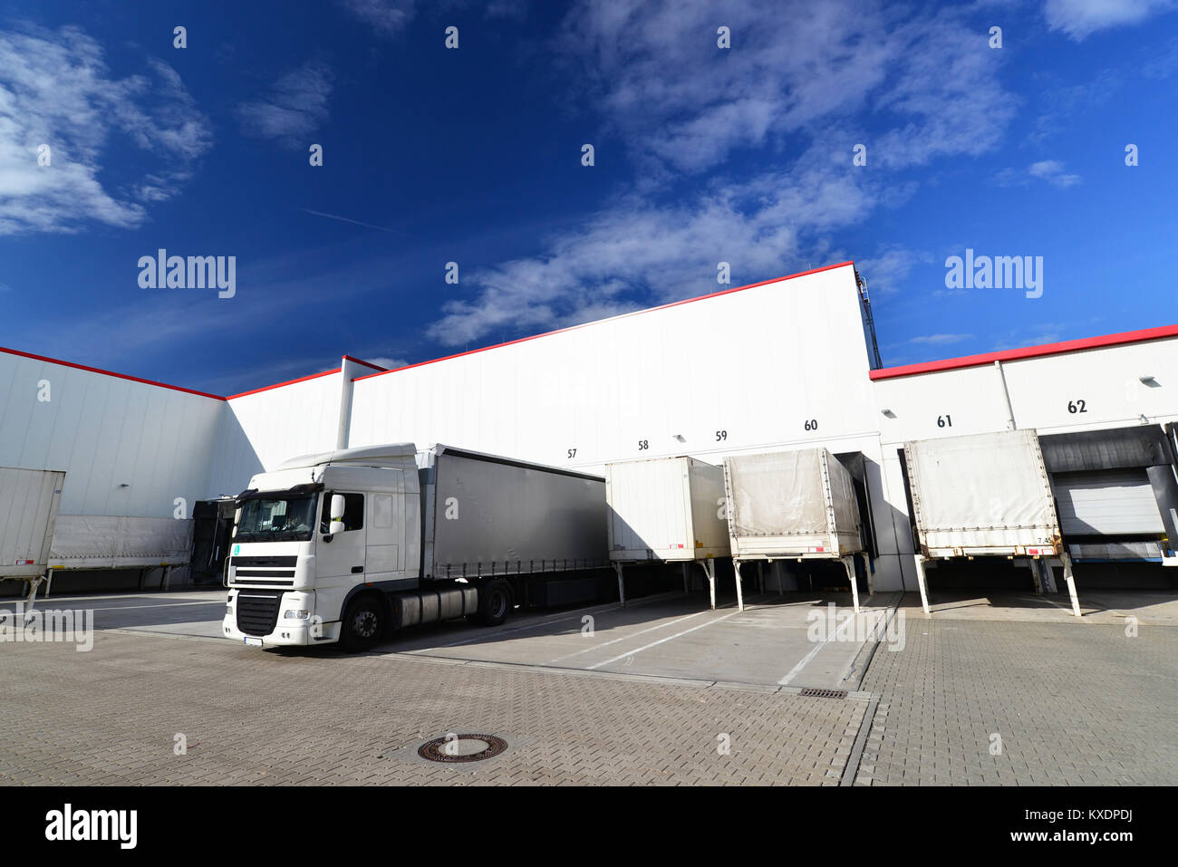 loading of lorries at the warehouse of a freight forwarding company ...