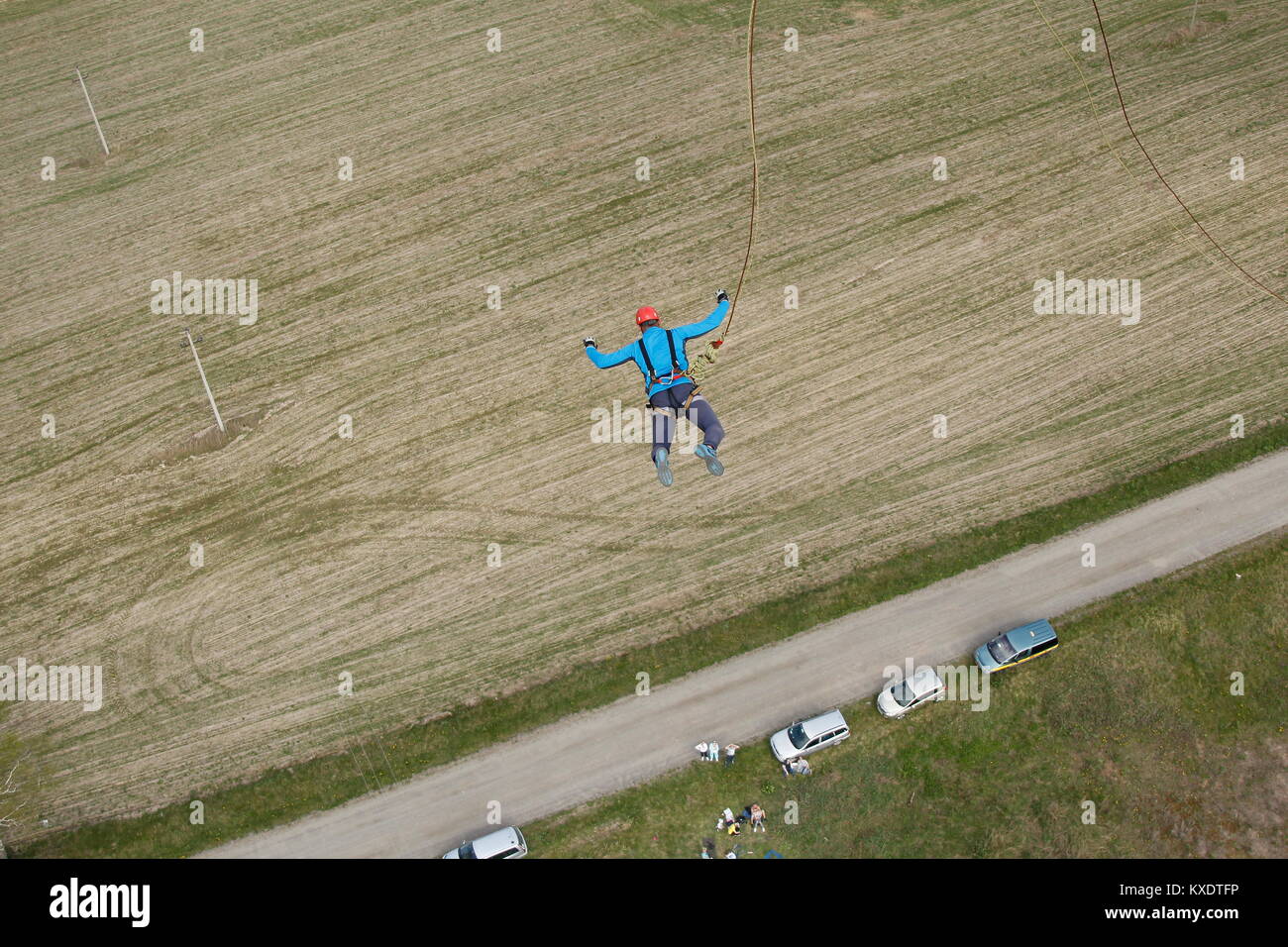 Belarus, Gomel, May 06, 2017.Jumping with a rope.Extreme man jumping ...