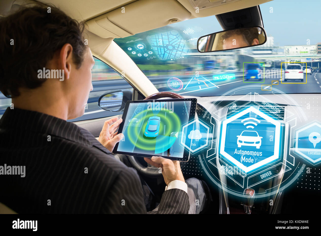 Caucasian man riding autonomous car. Self driving vehicle. Driverless ...