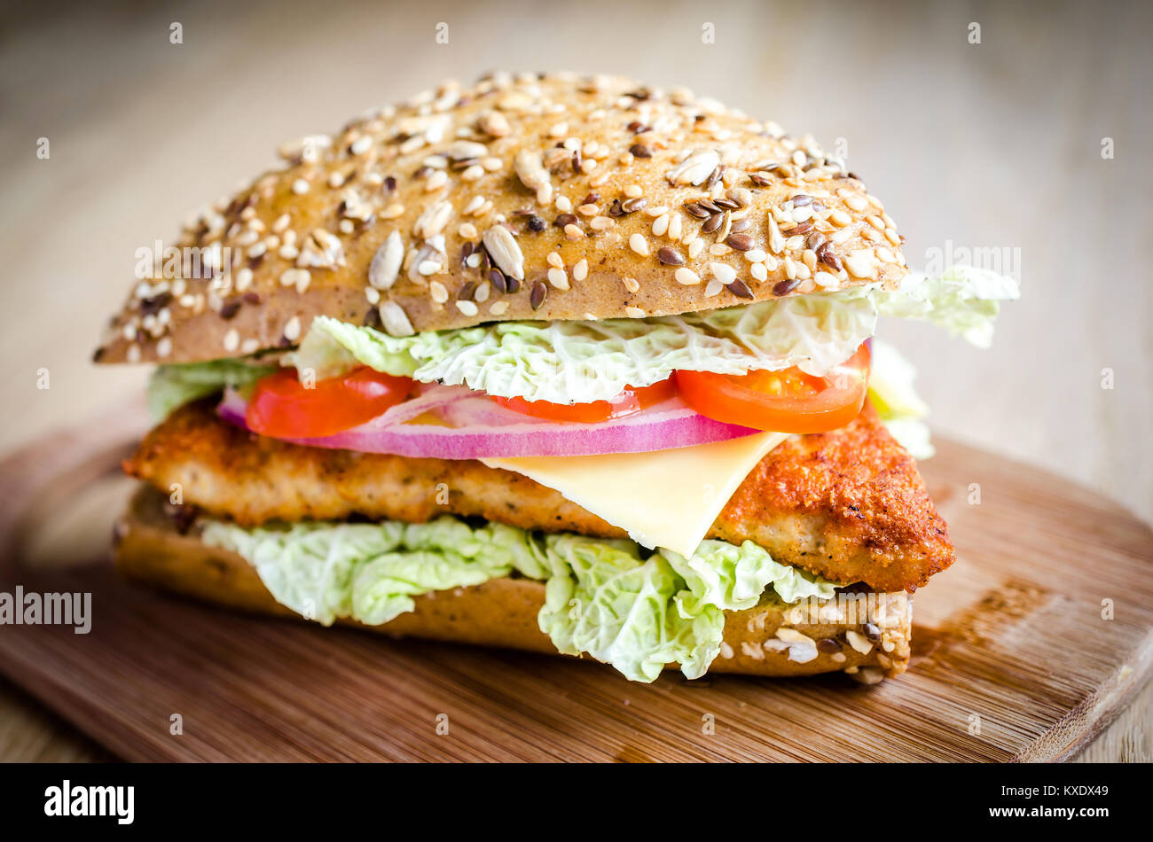 Triangle wholewheat-bun hamburger Stock Photo - Alamy