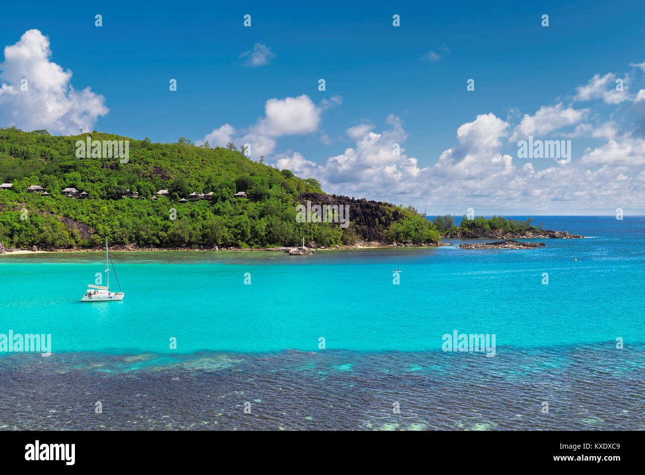 Sailboats in a beautiful bay in Seychelles Stock Photo - Alamy
