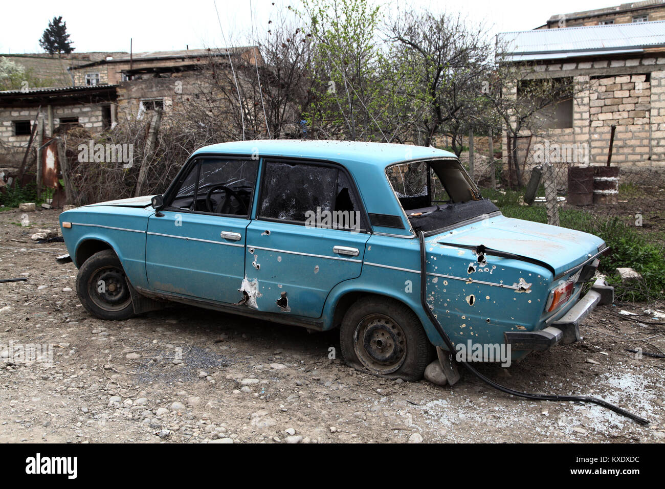 Destroyed car after war Stock Photo - Alamy