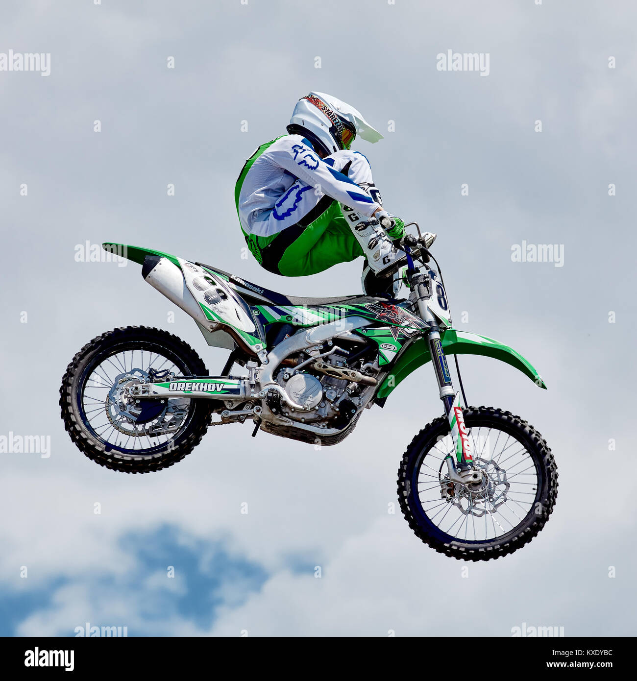 Professional rider at the FMX (Freestyle Motocross) make an acrobatic ...