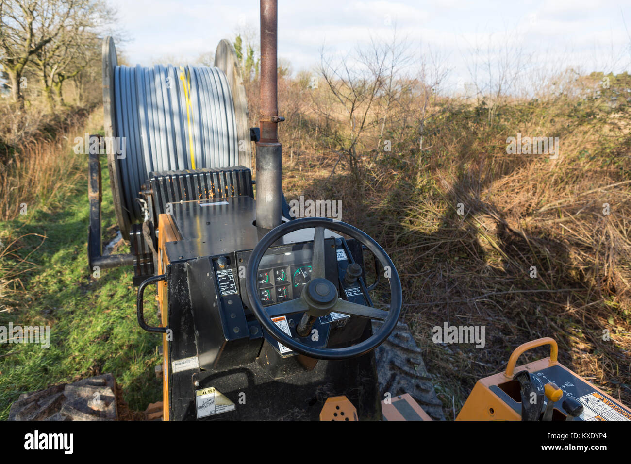 Case 960 Turbo cable laying trencher machine with spool of fibre-optic ...