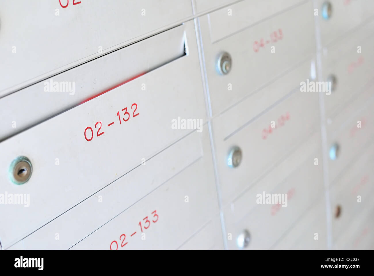 Row of metallic letter boxes for concepts such as safety and security ...