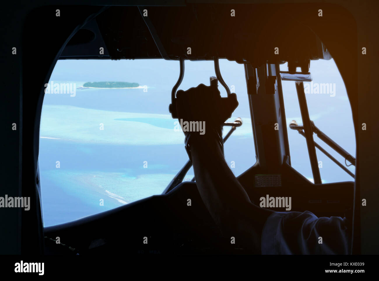 View from inside seaplane cockpit looking out to bright famous beach ...