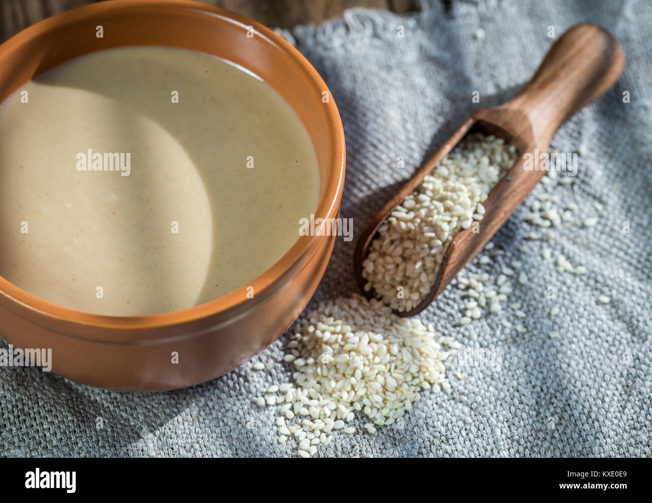 Bowl of tahini Stock Photo - Alamy