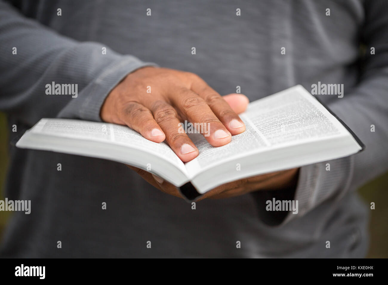 African man reading bible hi-res stock photography and images - Alamy
