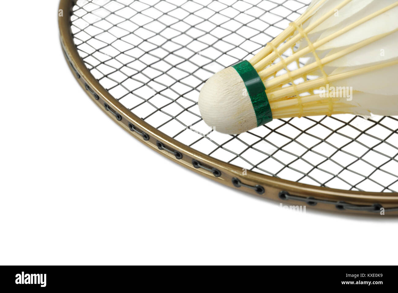 Shuttlecock on badminton racket with isolated white background. For ...