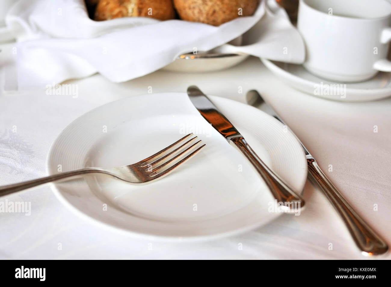 High class table layout with white kitchen utensils during a meal Stock ...