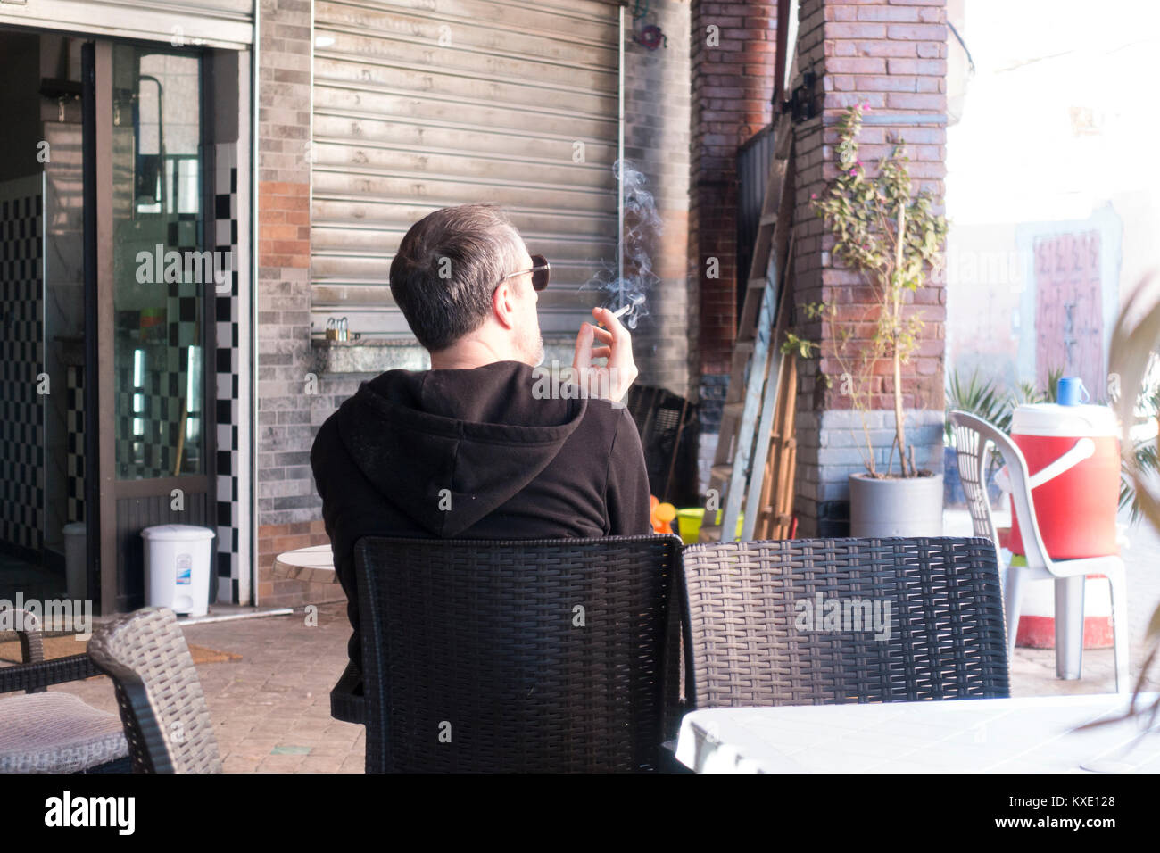 A man smoking, Marrakesh Stock Photo - Alamy