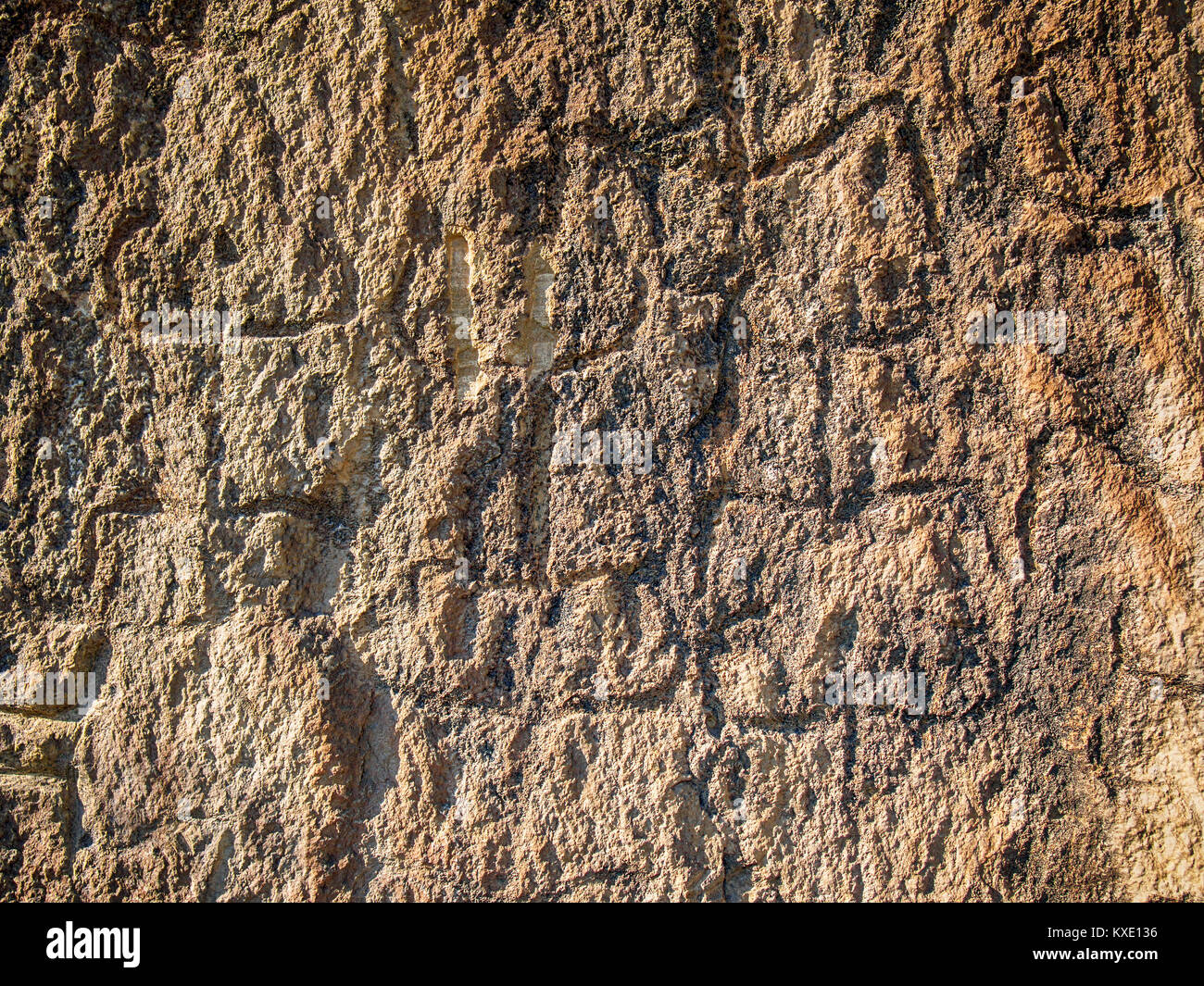 Real rock wall with petroglyphs background (in the Gobustan National ...