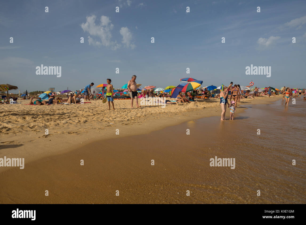 MANTA ROTA, PORTUGAL - AUGUST 25, 2017: People at the famous beach of ...
