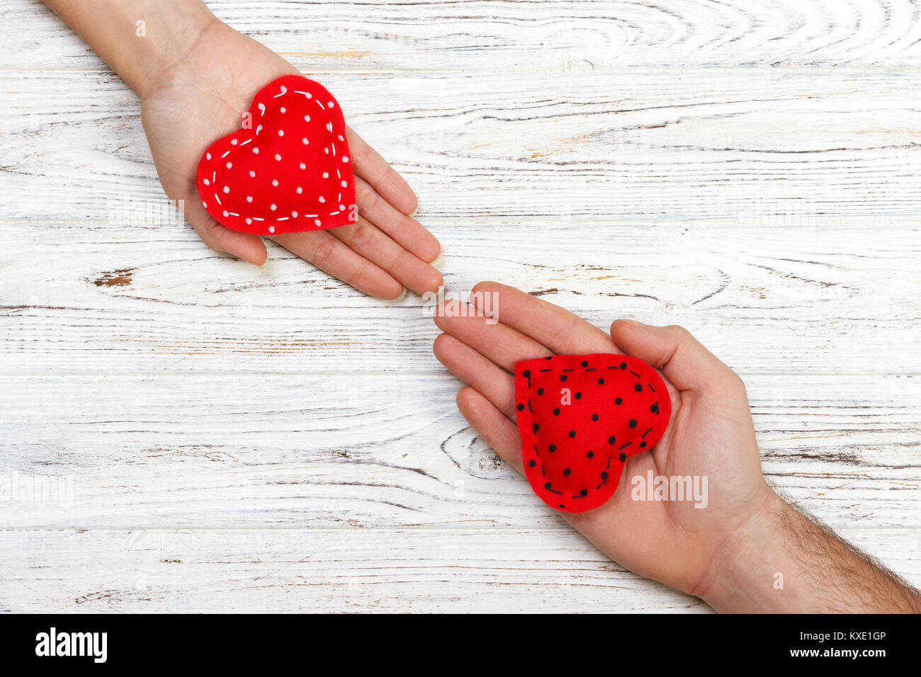 Love Concept : Girl holding and giving red heart to her boyfriend hand ...