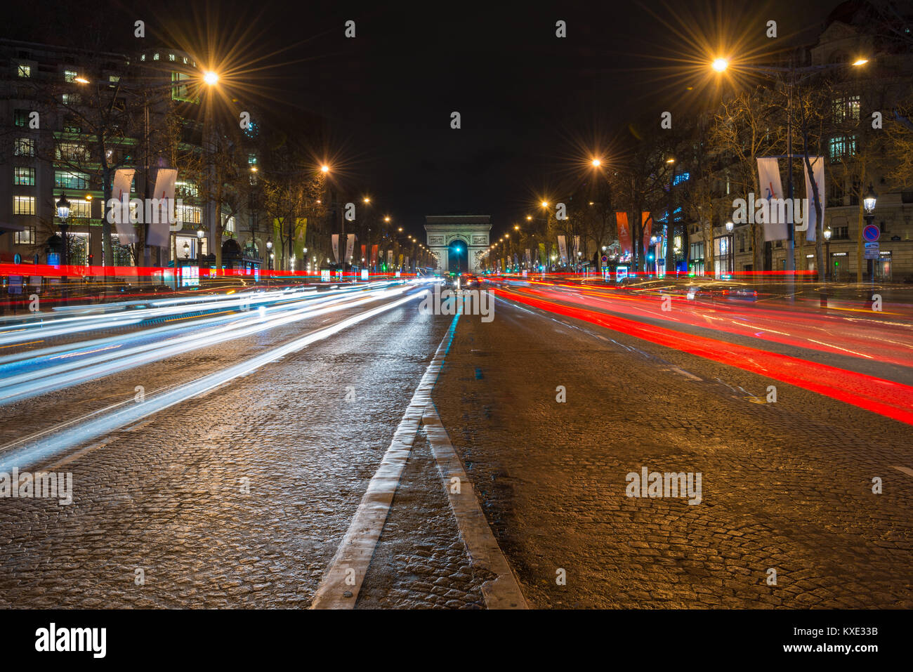 The Avenue Des Champs Élysées Leading Towards The Arc De Triomphe