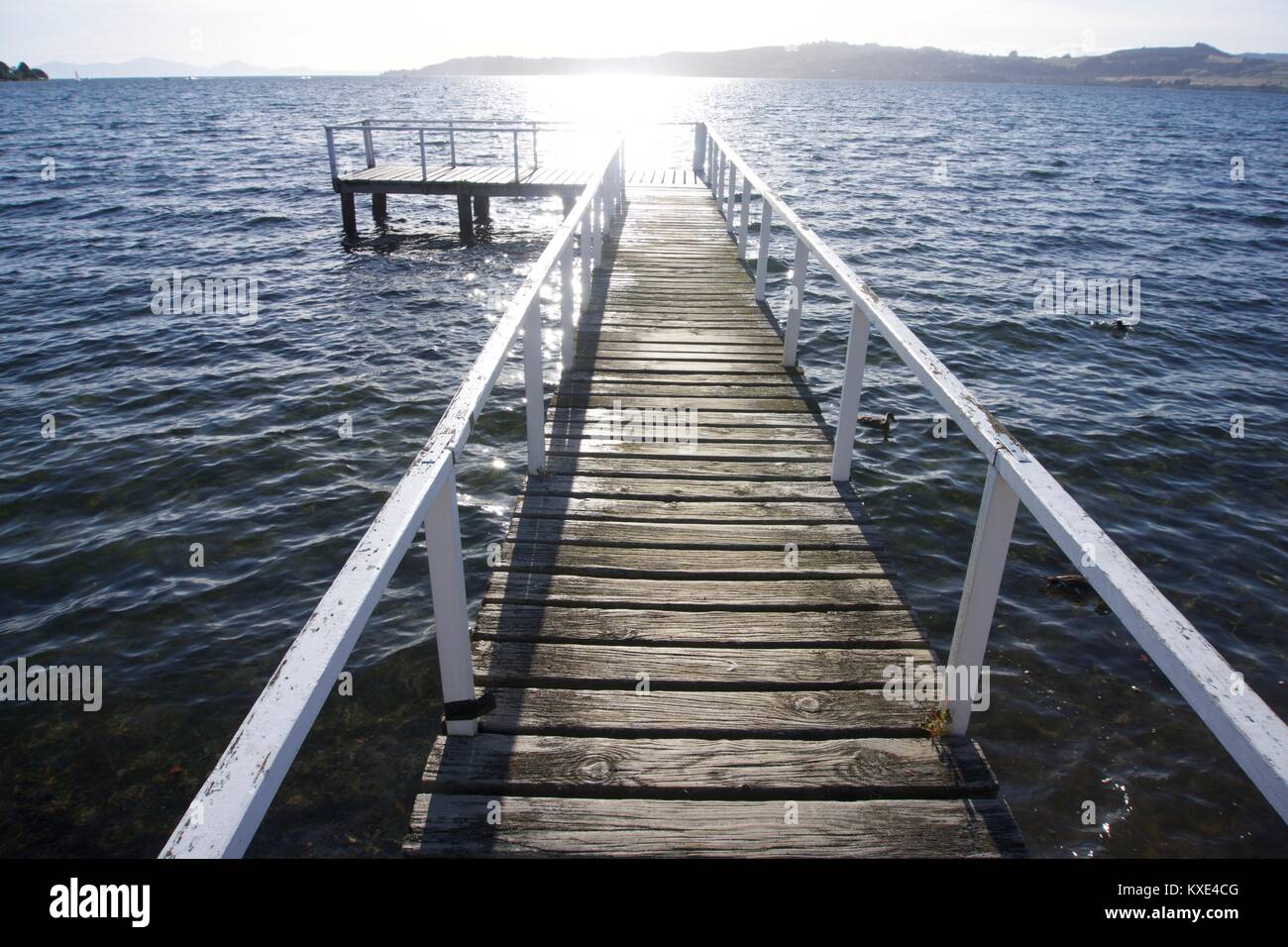 Lake Jetty Sunset Stock Photo - Alamy