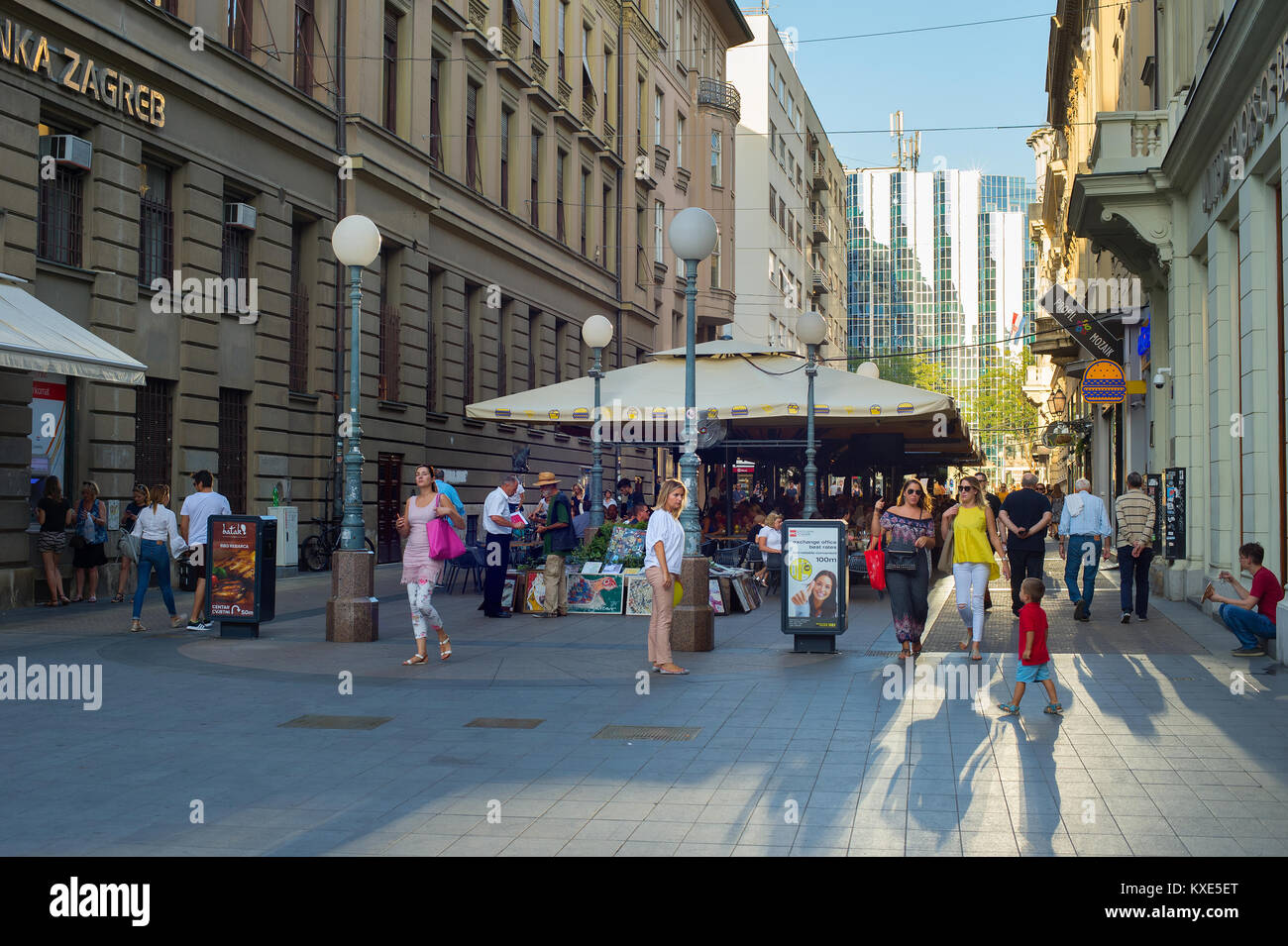 ZAGREB, CROATIA - AUG 24, 2017: People walking by the Downtown street ...