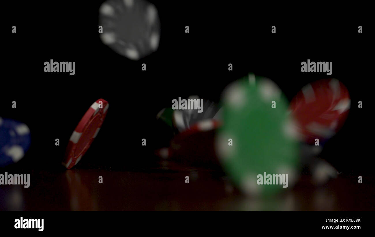 Poker chips fall on table hi-res stock photography and images - Alamy