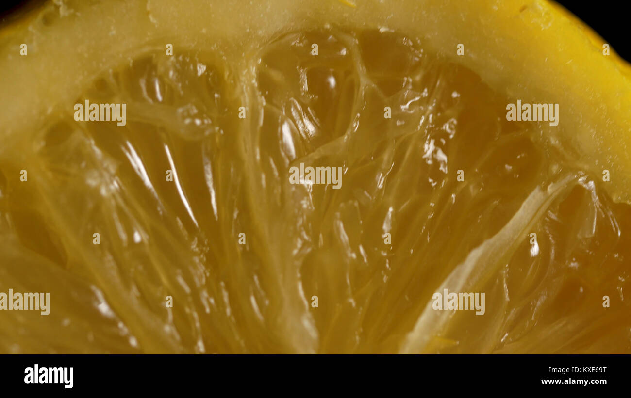 Lemon sectional on black background. Half lemon on a black background ...