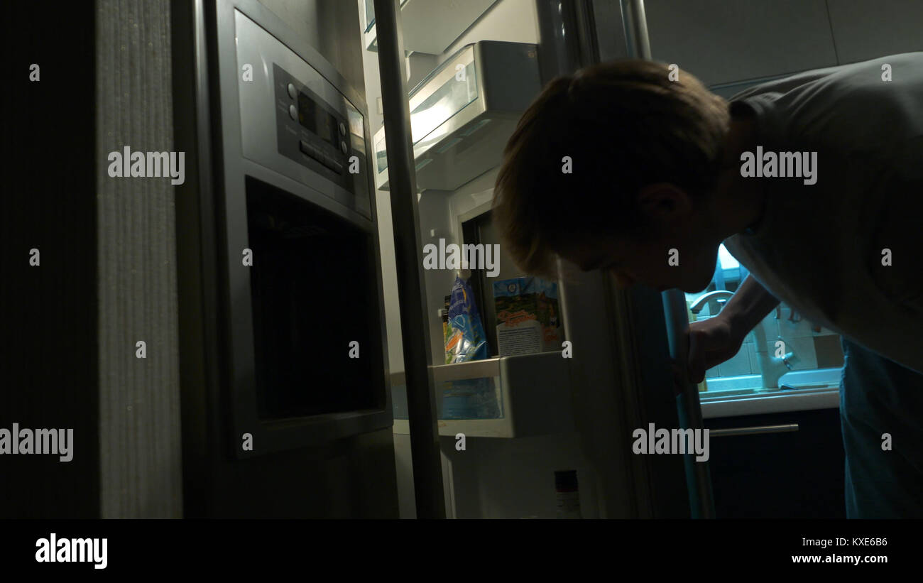 Person head in fridge hi-res stock photography and images - Alamy