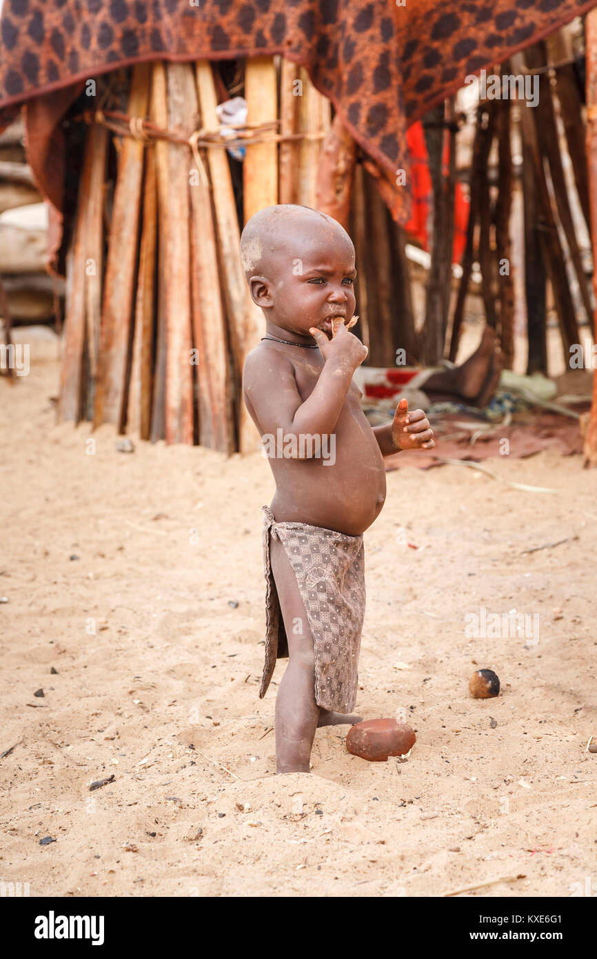 Small child of the Himba tribe people indigenous to the Kunene Region ...