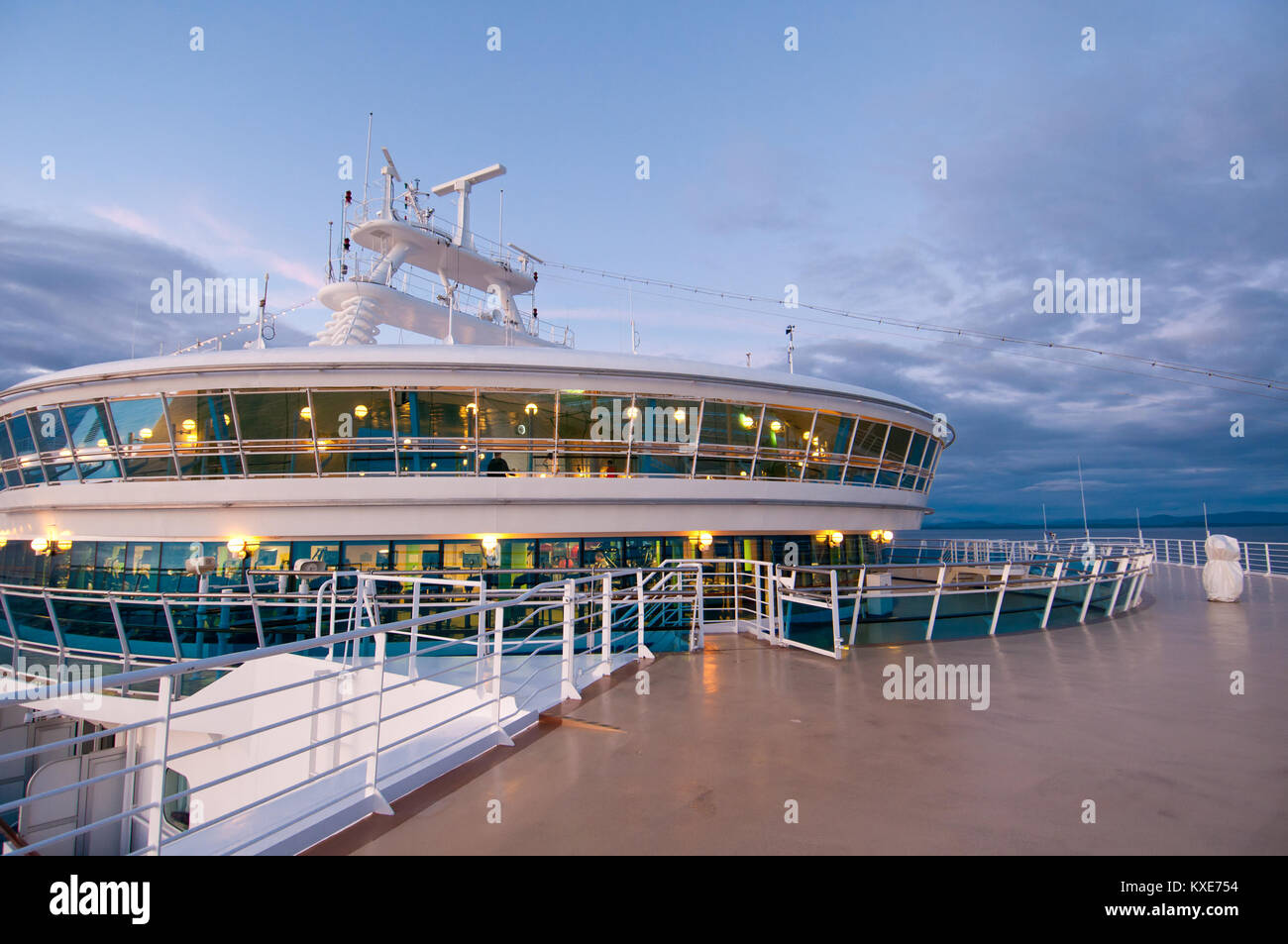 View of front deck of cruise ship sailing during sunset Stock Photo - Alamy