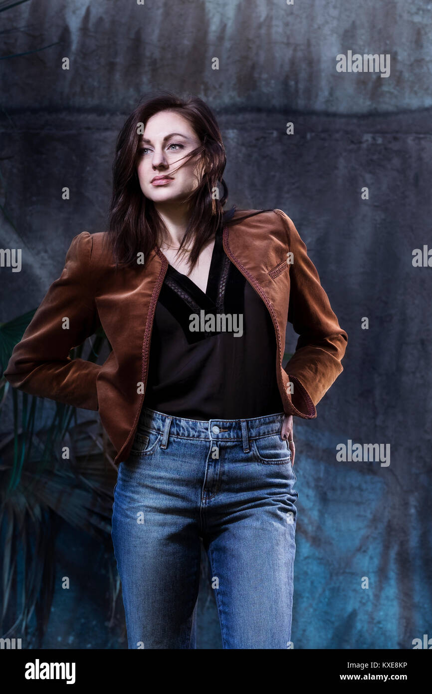 Young trendy woman in urban setting Stock Photo - Alamy