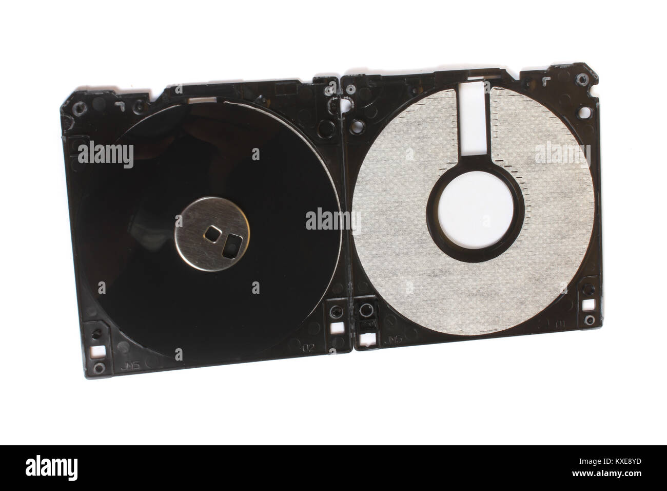 An old floppy used for storing data stripped down showing its magnetic ...