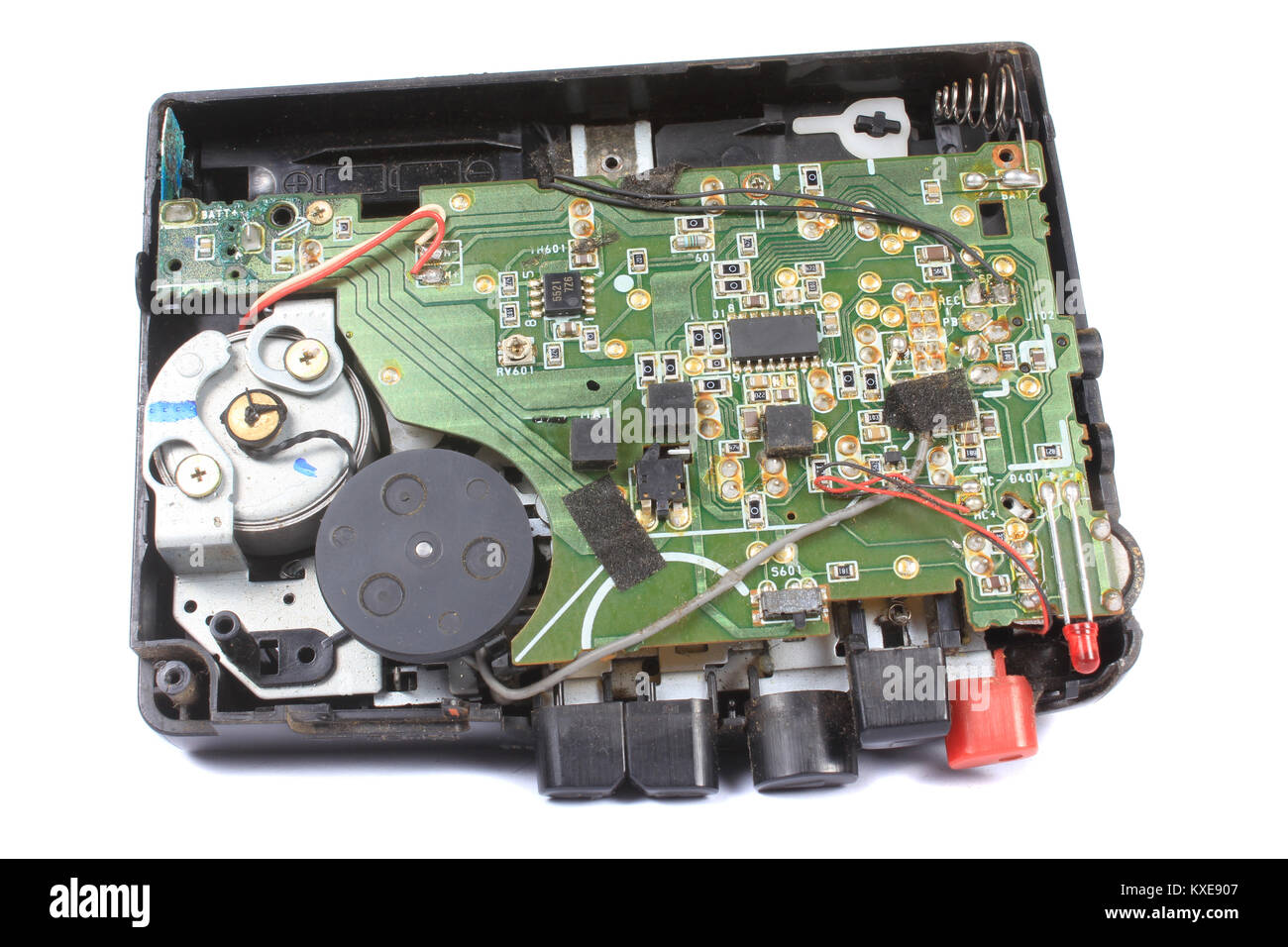 An old audio cassette walkman stripped down to show its circuitry and ...
