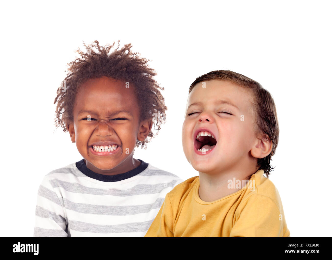 Two beautiful children laughing isolated on a white backround Stock ...