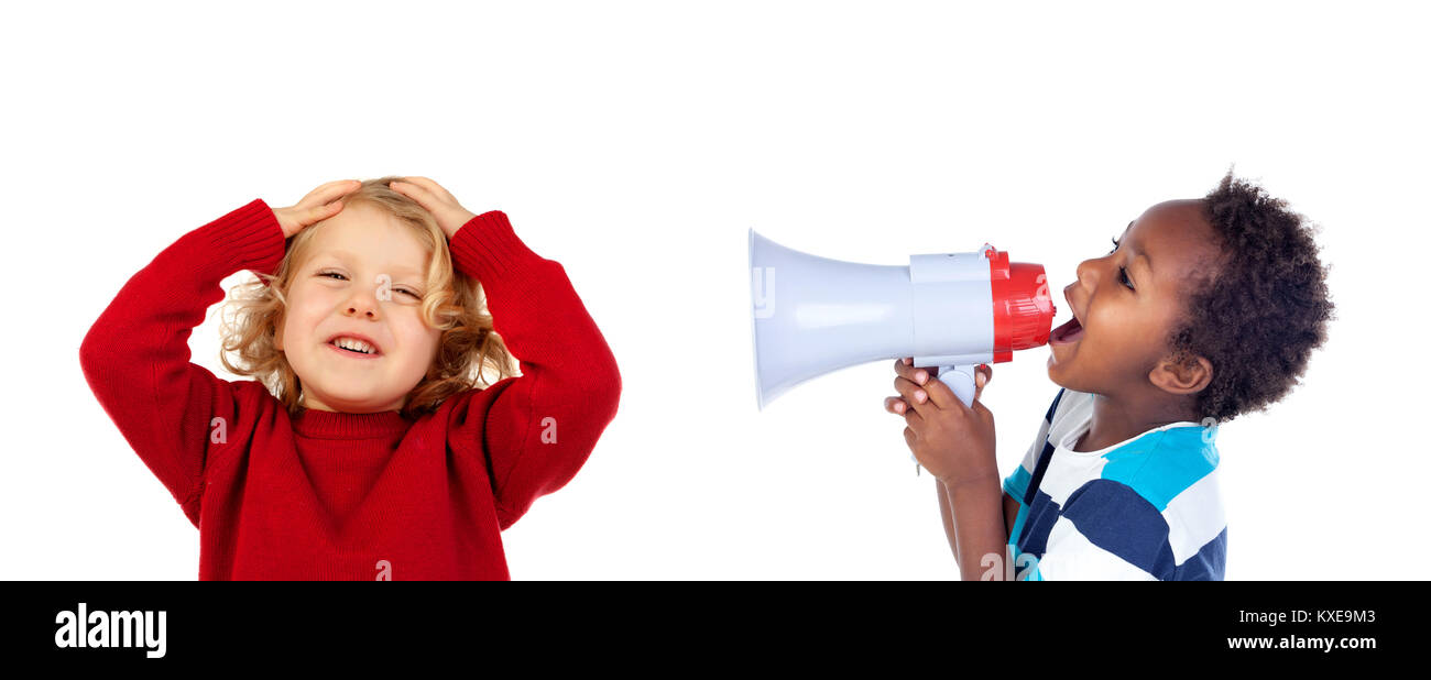 Funny little boy shouting through a megaphone to his friend. Isolated ...