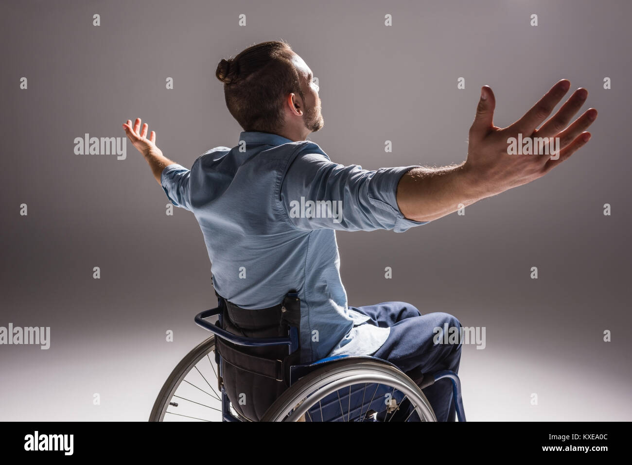 Disabled man with arms outstretched Stock Photo - Alamy