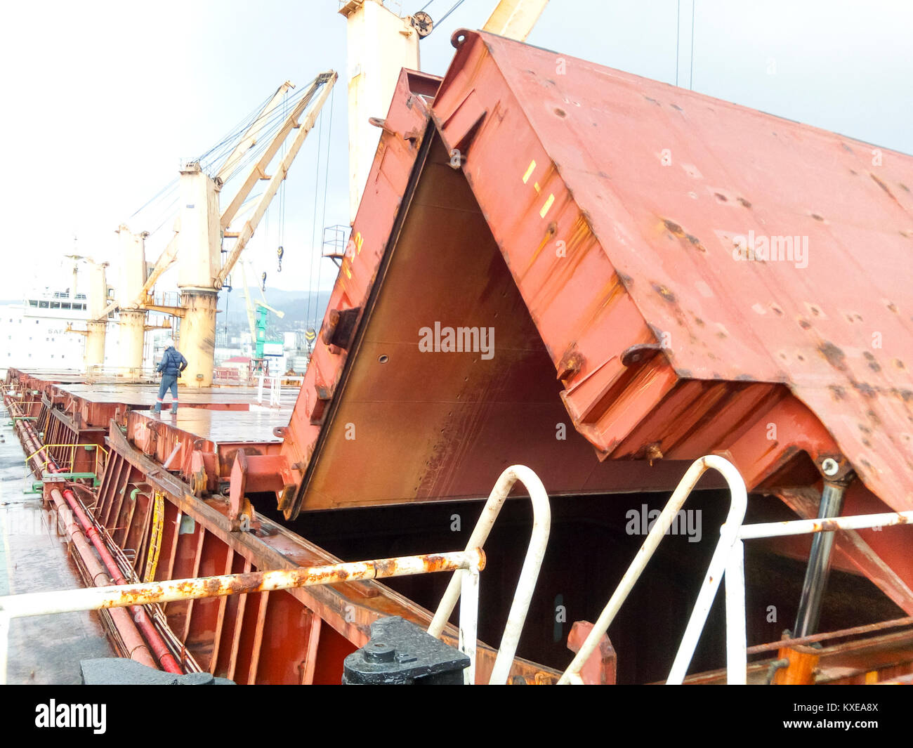 Folded steel roof of the hold on the ship Stock Photo - Alamy