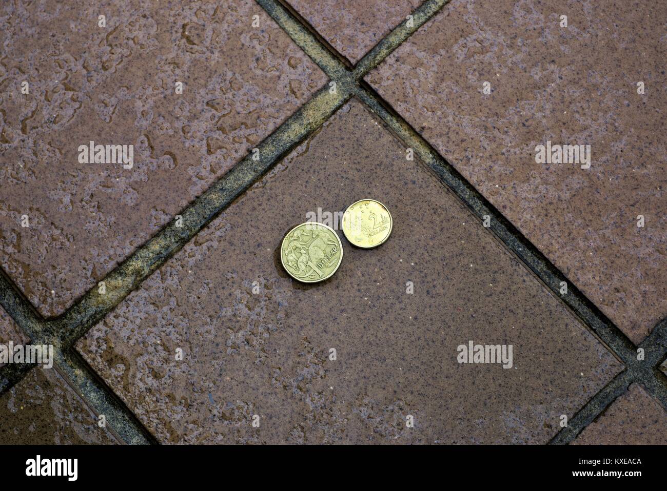 Coin on floor hi-res stock photography and images - Alamy