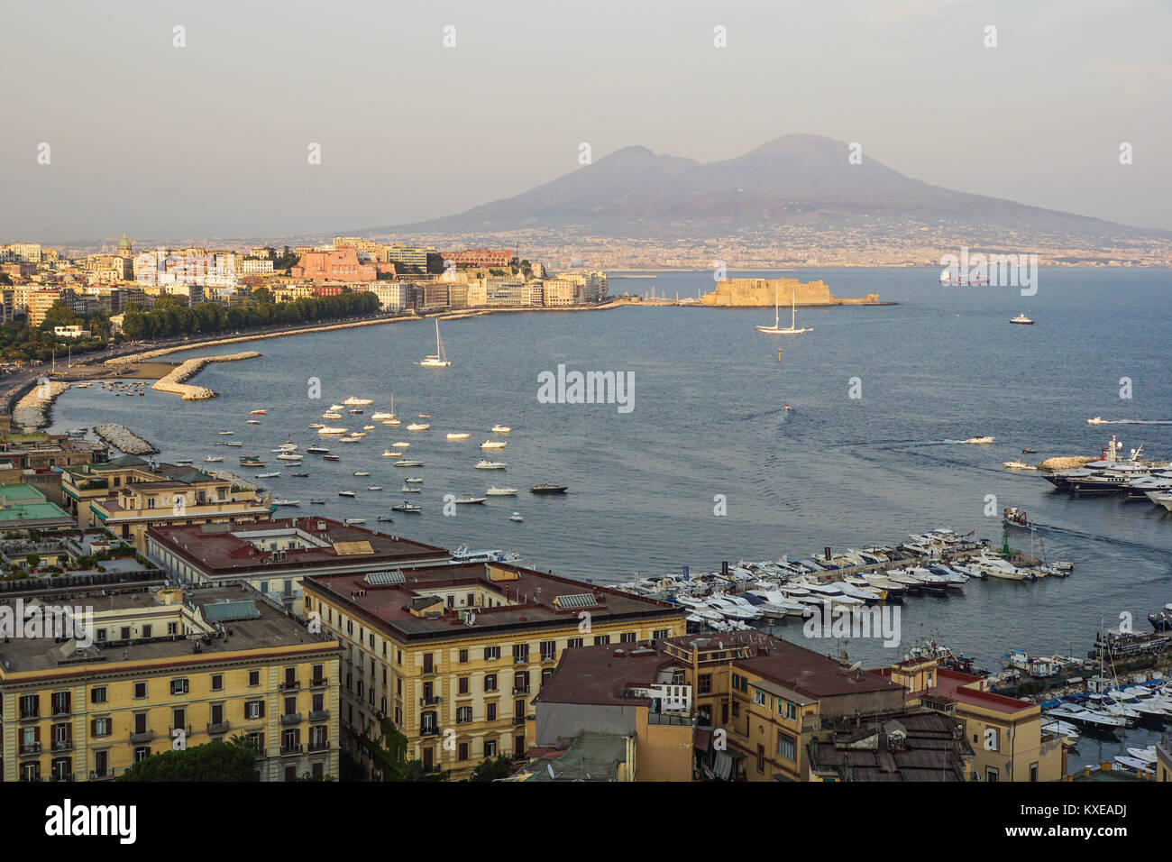 Napoli (Naples) and mount Vesuvius in the background at sunset in a ...